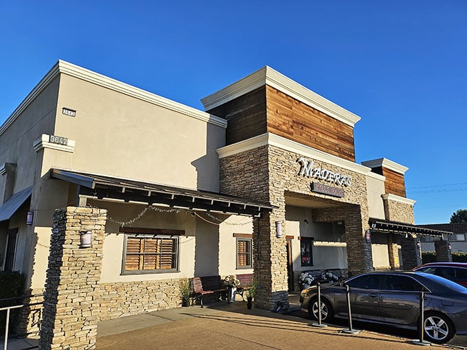 Stone and stucco create a Southwestern vibe. Inside, steaks sizzle with the same warmth as the California sun.