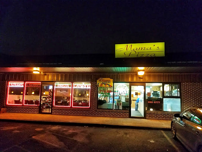 Mama's Pizza: When the neon lights glow at night, pizza pilgrims know they've reached the promised land of cheese and sauce.