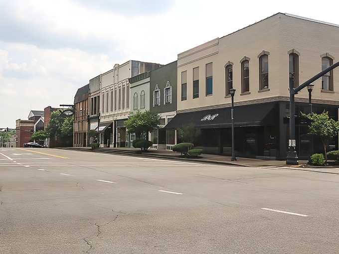 Mayfield's historic buildings stand tall against Kentucky's blue skies, offering charm you can't find in big-city developments.