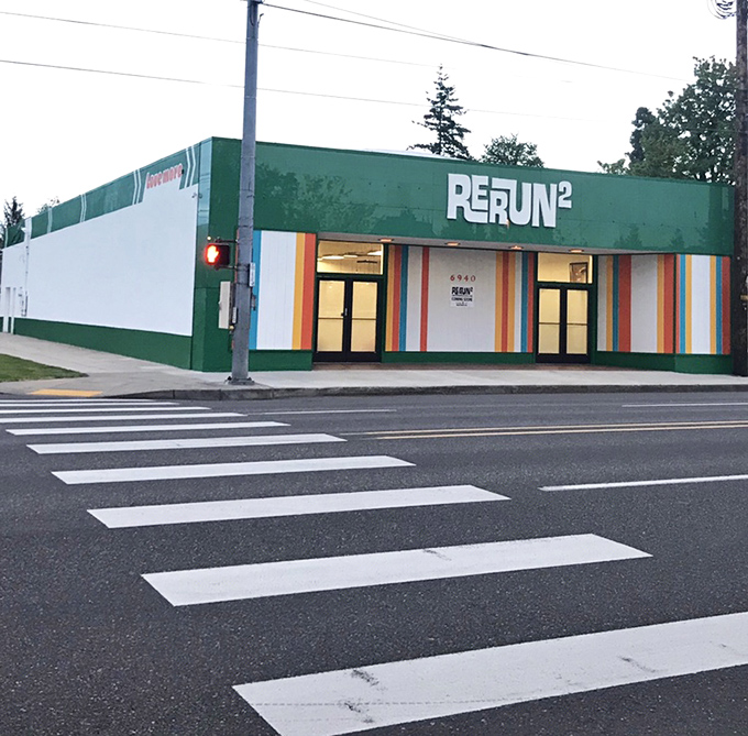 Rerun's vibrant rainbow stripes and green exterior make it the peacock of Portland's thrift store scene.