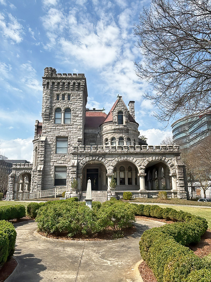 Atlanta's hidden castle gem! This Stone Mountain granite masterpiece stands defiantly among glass skyscrapers like a medieval time traveler.