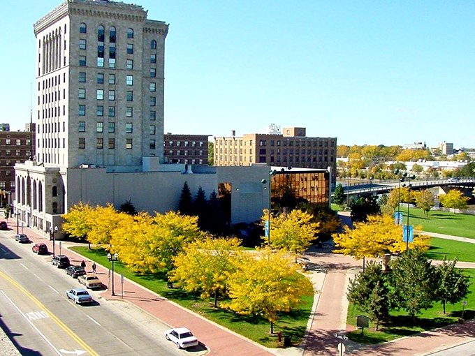 Saginaw's historic buildings stand tall against blue skies &ndash; affordable living with a side of architectural grandeur!