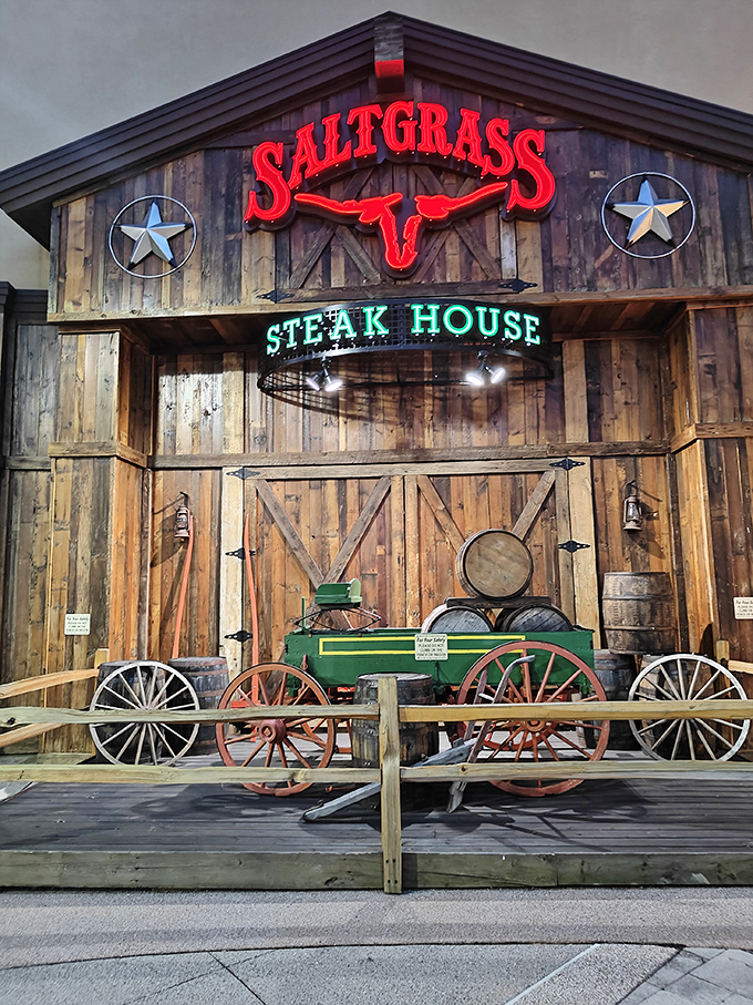 Saltgrass Steak House (Nashville): Wagon wheels, wooden walls, and a glowing red sign &ndash; Texas swagger meets Nashville flavor.