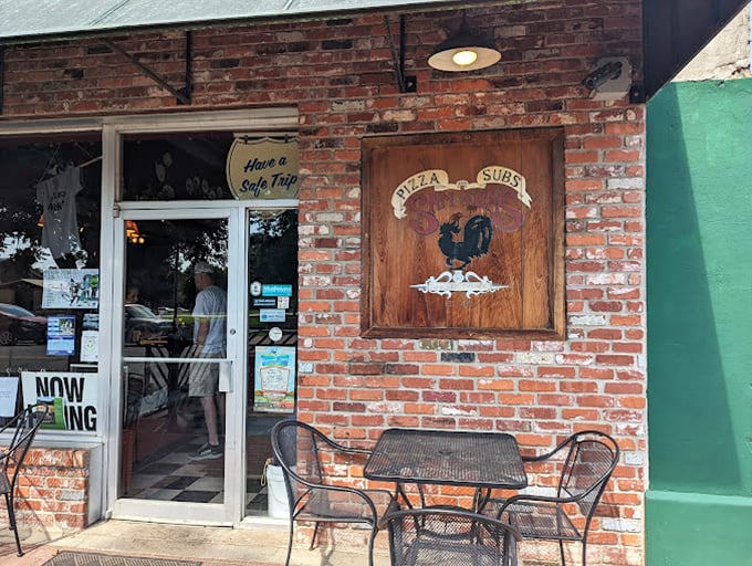 Sam & Ella's wooden sign winks at you with its clever wordplay. This brick storefront holds pizza secrets worth discovering.