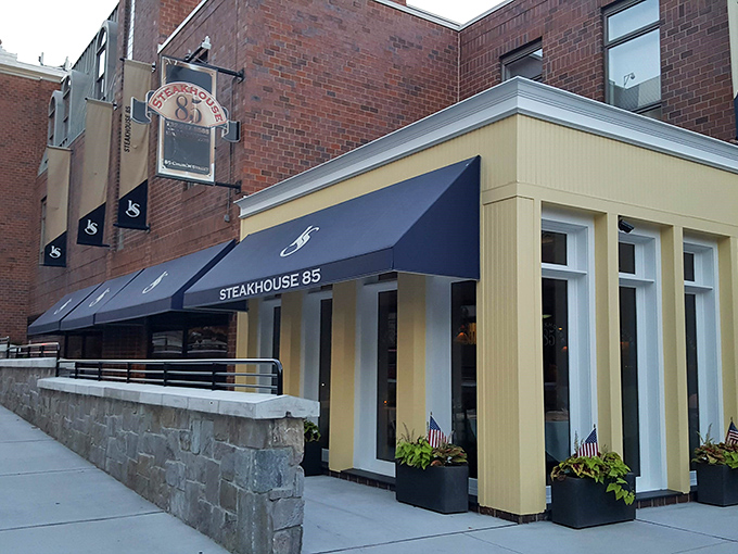 Steakhouse 85's bright yellow facade stands out like a culinary exclamation point in New Brunswick. Impossible to miss, impossible to forget!