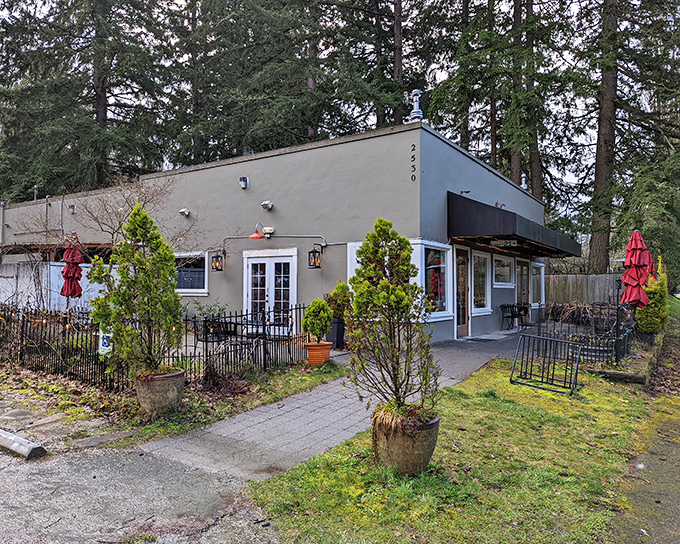 The Fork at Agate Bay's cozy exterior hints at the forest retreat vibe waiting to pair with your perfectly seared steak.