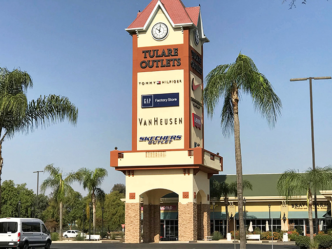 Tulare's distinctive outlet center clock tower stands like a cheerful greeter saying, "Welcome to shopping that won't empty your wallet!"