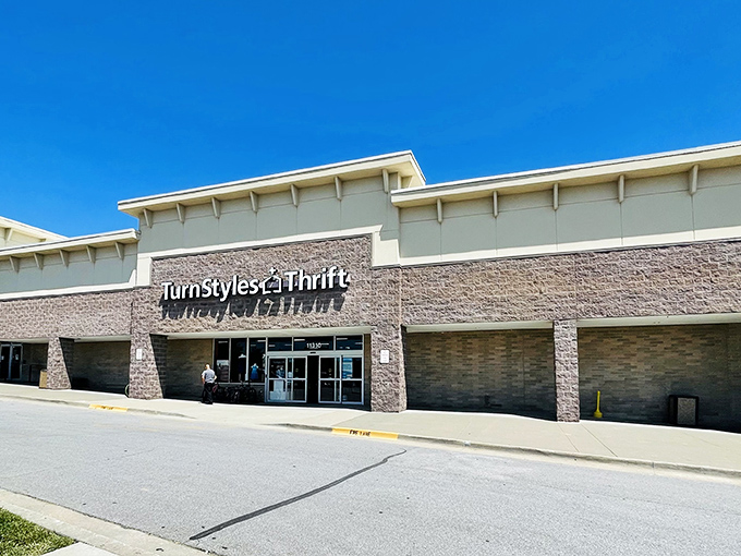 TurnStyles presents a more upscale thrift experience. The stone facade suggests quality finds await behind those glass doors.