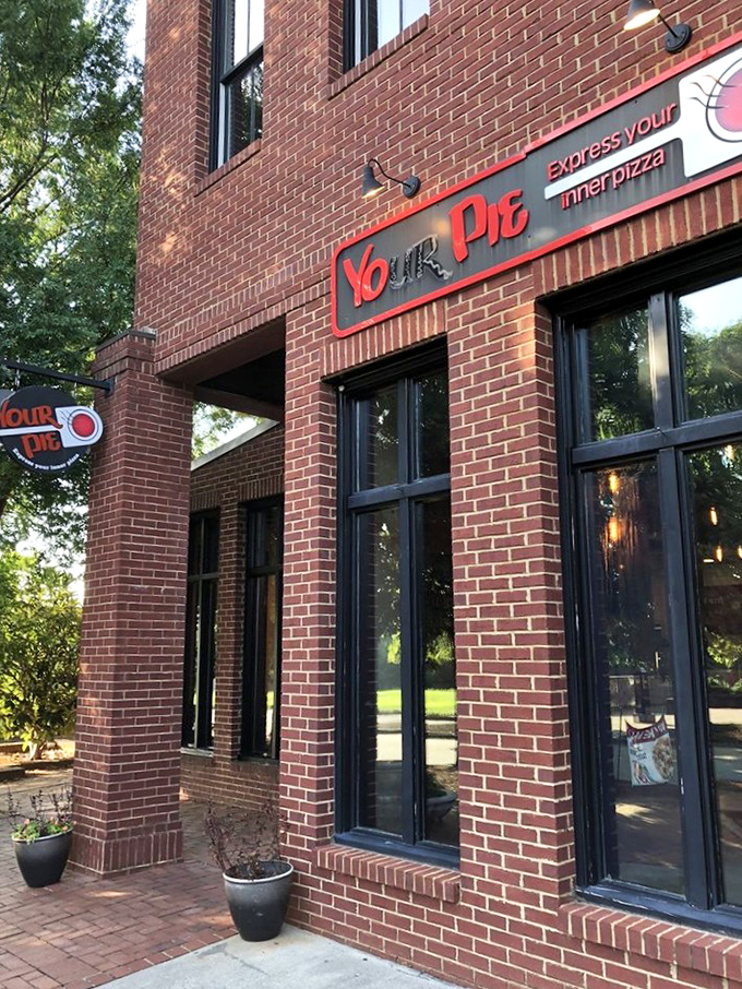 Your Pie's brick fa&ccedil;ade and modern signage invite you to express yourself through toppings&mdash;it's like pizza therapy, but tastier.