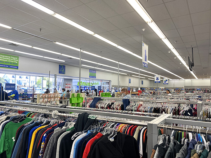 Under bright lights, endless racks of clothing await their second chance. It's like a fashion runway where every era gets equal billing.