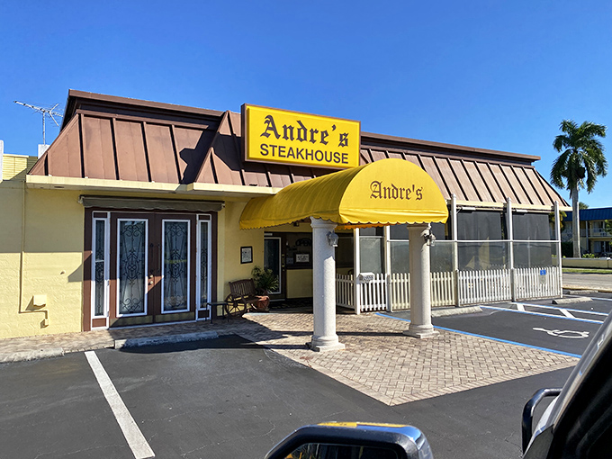 Classic columns and a welcoming entrance hint at the timeless steakhouse experience waiting inside this Naples institution.