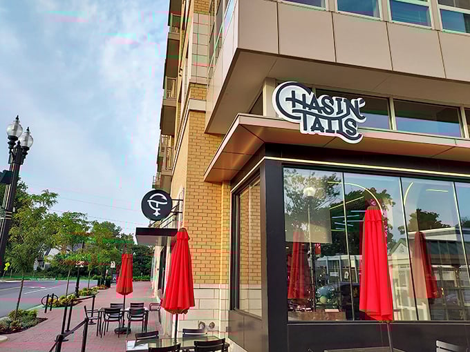 Urban seafood paradise alert! Chasin' Tails' bright signage beckons you to roll up your sleeves and embrace the beautiful mess ahead.