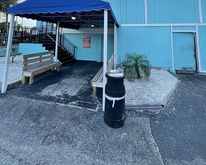Those simple wooden benches have witnessed countless "first bite" faces &ndash; that moment when grouper perfection meets taste buds.