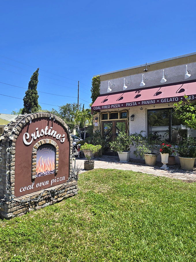 Mediterranean charm meets coal-fired tradition at Cristino's, where even the building looks as inviting as the pizza inside.