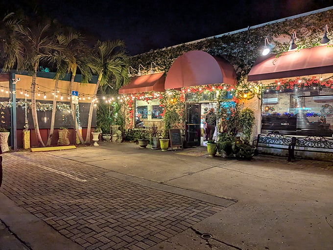 Night falls, but Cristino's glows with twinkle lights and pizza promise. Their garden patio feels like dining in a Mediterranean dream.