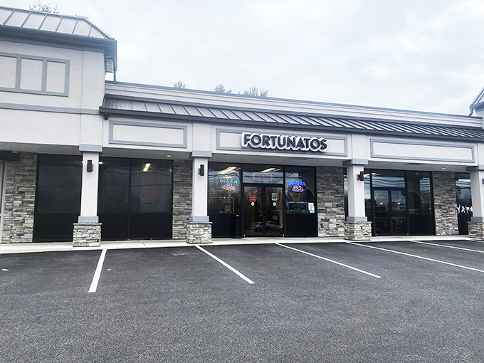 The modern, unassuming exterior of Fortunato's is the Clark Kent disguise for the Superman pizza waiting inside.