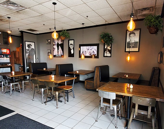 Vintage vibes and classic booths create the perfect setting for pizza that tastes like childhood memories.