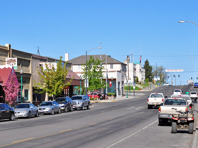American flags line Grangeville's welcoming main street, where your Social Security dollars stretch like nowhere else.