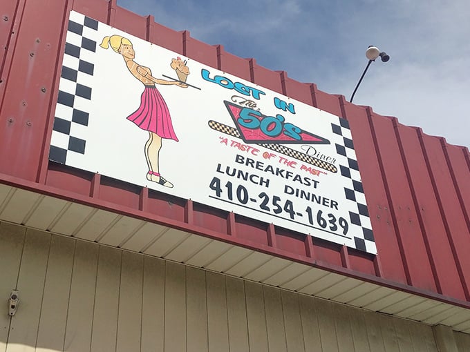 Lost in the 50's Diner (Baltimore): Where the waitress cartoon on the sign isn't just decoration - it's a promise of simpler, delicious times ahead.