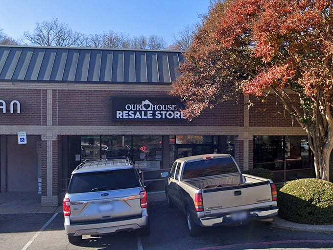 Fall colors frame this unassuming storefront where bargain hunters find designer deals year-round.
