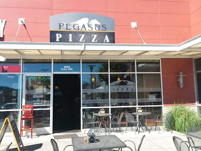 The simple outdoor seating area is like a front-row ticket to Eugene's favorite pizza show.