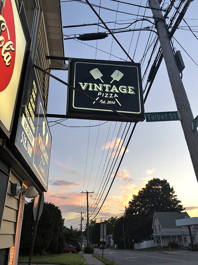 As the sun sets behind Vintage Pizza, locals line up for what they know is some of Manchester's most craveable pizza perfection.