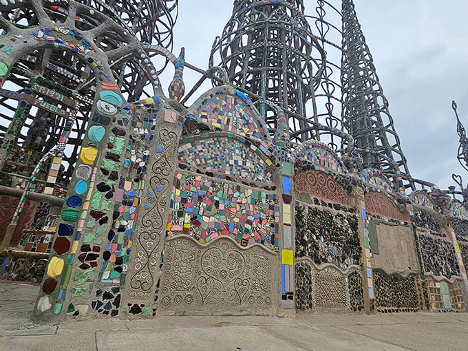 Mosaic patterns dance across curved surfaces where everyday objects become extraordinary art at the iconic Watts Towers.
