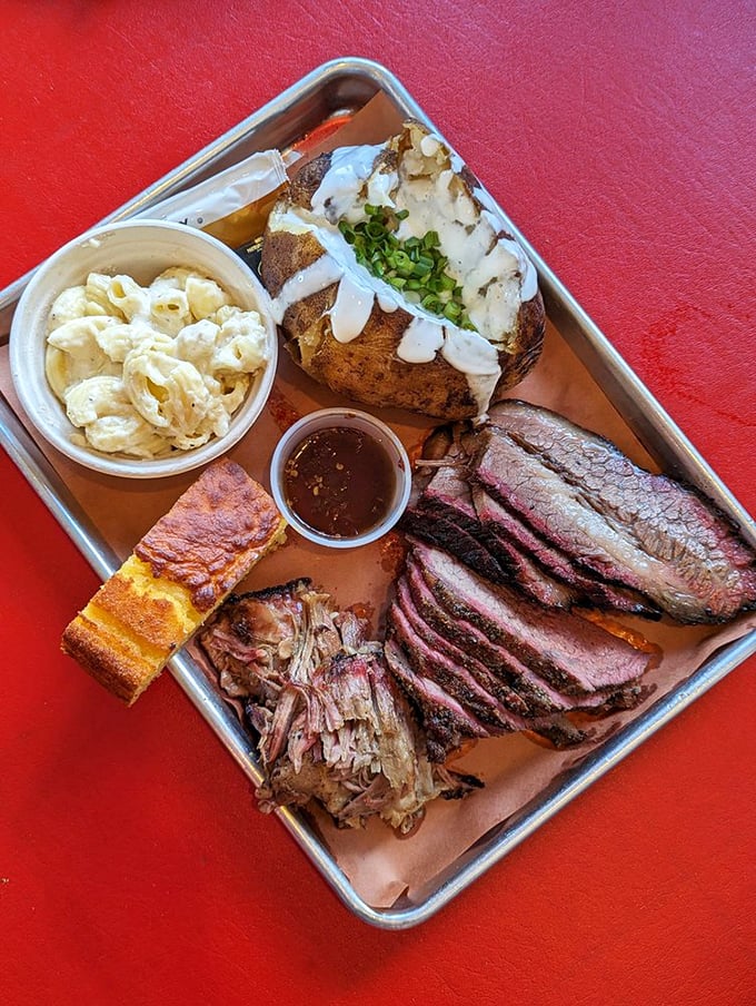 The carnivore's fantasy league draft pick. Brisket, pulled pork, and more cohabitate with mac and cheese and a loaded potato in meaty harmony.