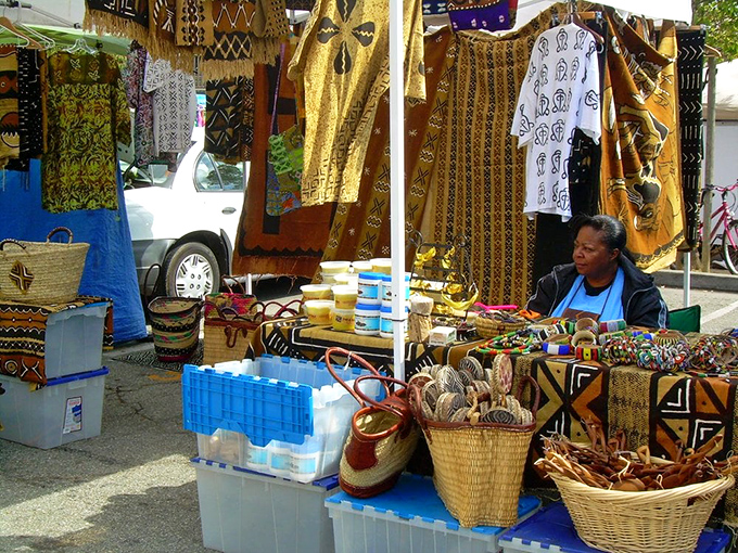 A tapestry of African-inspired textiles and handcrafted baskets that transform "I need storage solutions" into "I've just acquired functional art."