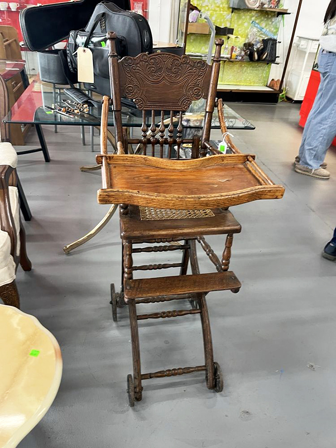 This vintage wooden highchair has weathered decades of mealtime battles and still stands ready for another generation of pea-throwers.