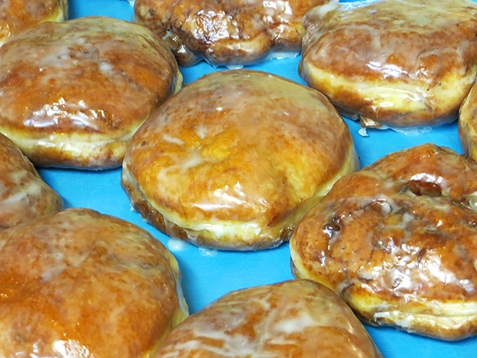 These golden-brown fritters glisten with glaze like they've just emerged from some magical oven. Resistance is futile.