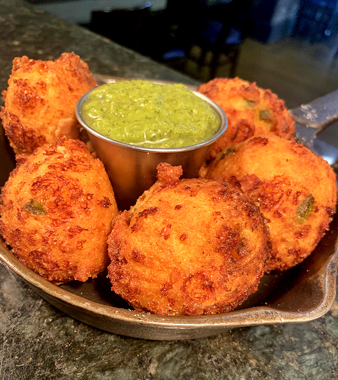 Golden-fried perfection with a kick of heat. These hushpuppy cousins aren't asking for your attention – they're demanding it.
