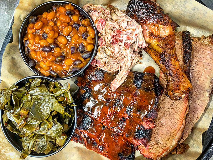 The BBQ sampler that solves life's toughest question: "Which meat should I order?" The answer: All of them, with beans and greens for good measure.