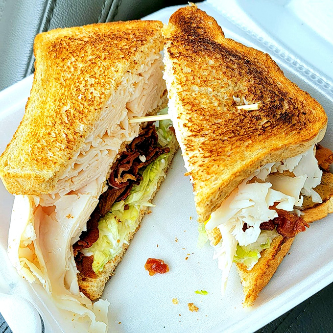 This double-decker sandwich isn't just stacked&mdash;it's architectural genius. Turkey, bacon, and all the fixings create the skyscraper of sandwich satisfaction.