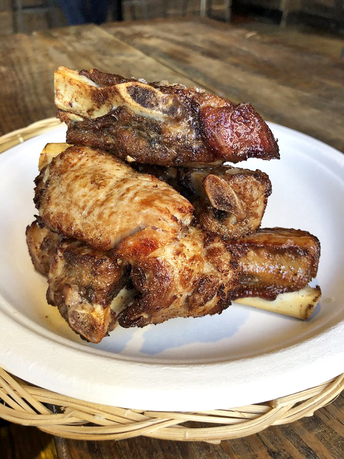 These aren't just ribs; they're a religious experience. Carnitas so tender they practically leap off the bone into your waiting mouth.