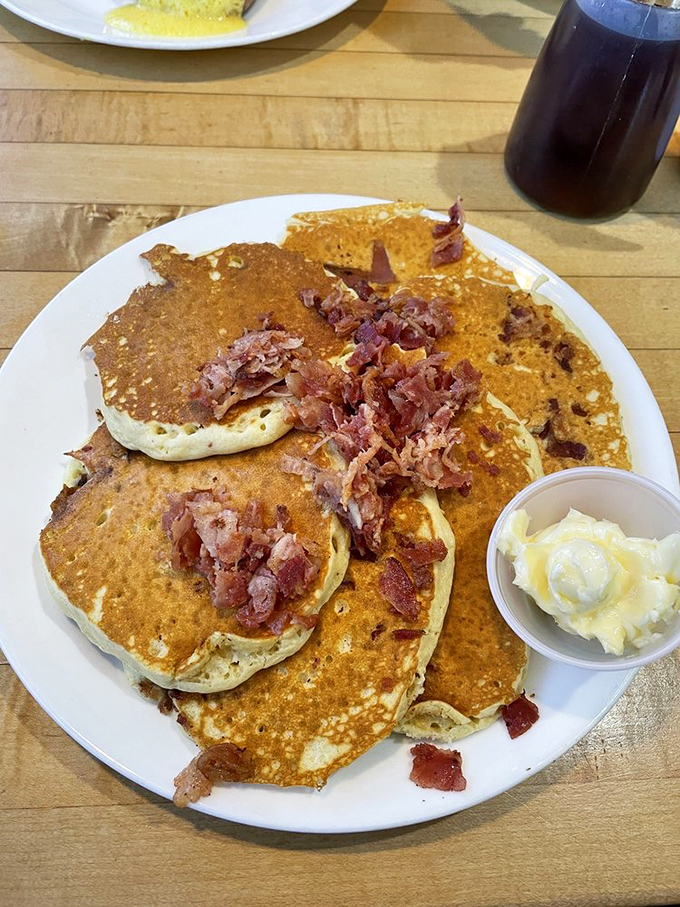 Bacon pancakes that answer the eternal question: "Why choose between sweet and savory when you can have both in every magnificent bite?"