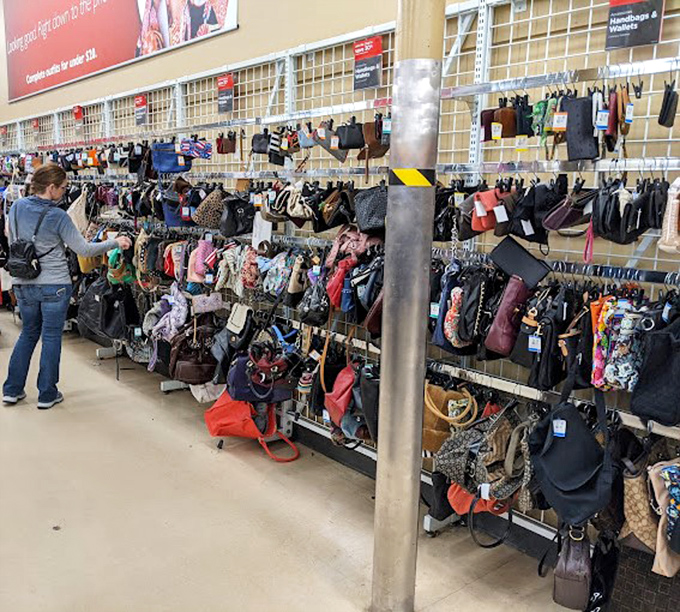The handbag wall&mdash;where designer knockoffs and authentic treasures hang side by side in democratic fashion harmony.