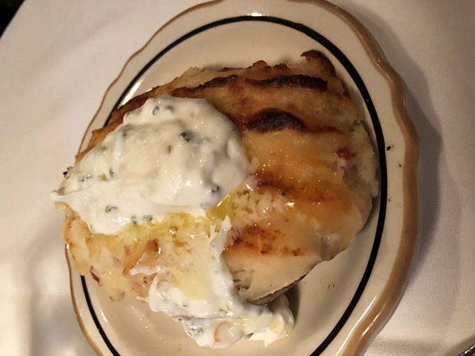 Some restaurants treat baked potatoes as an afterthought. At Al's, they're elevated to an art form with toppings that make you forget about counting calories.