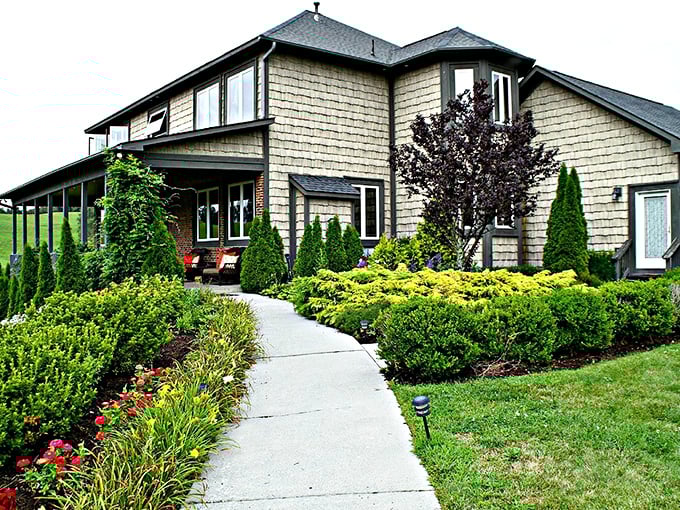 This Banner Elk home isn't just landscaped—it's curated. The kind of place where even the garden gnomes probably have advanced degrees in aesthetics.