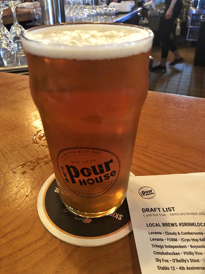 "A Better Beer Bar" isn't just a slogan—it's a promise kept in every perfectly poured pint. This golden beauty practically winks at you.