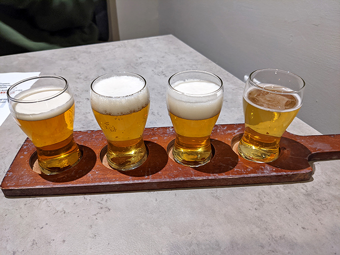 A flight of golden beers stands at attention, ready to cool the fire of spicy barbecue and wash away workday worries.