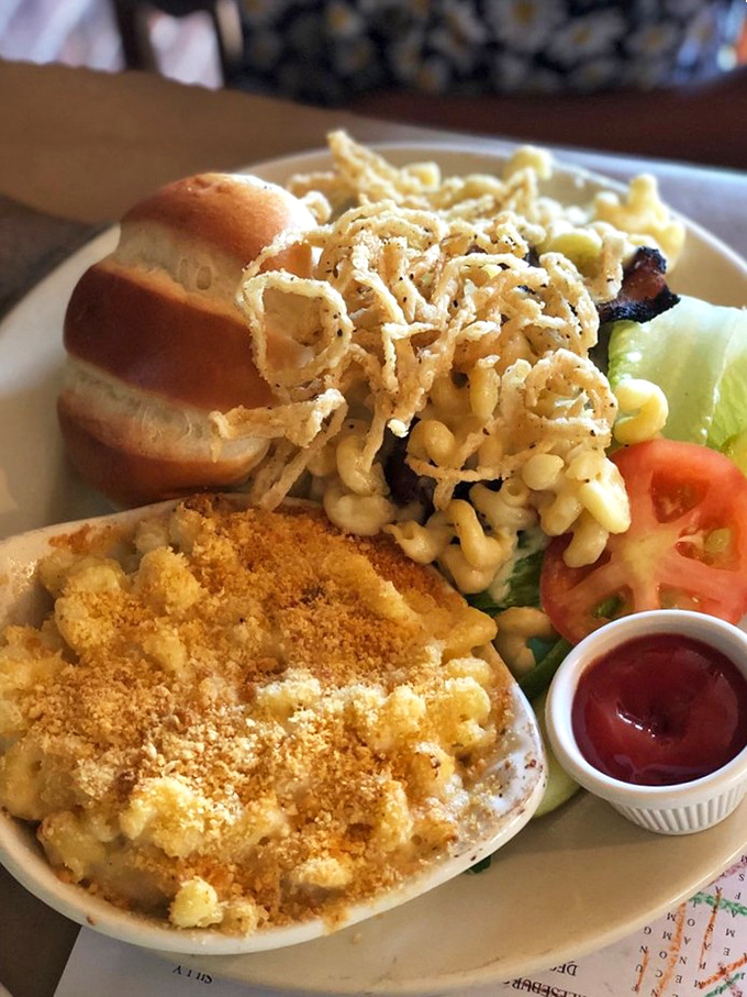 This isn't just a sandwich&mdash;it's architecture! Crispy fried onions crowning mac and cheese is the kind of innovation that deserves its own Nobel Prize category.