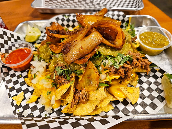 The perfect tray of nachos doesn't exi&mdash; Oh wait, here it is! That red soda alongside is the unsung hero of this flavor fiesta.