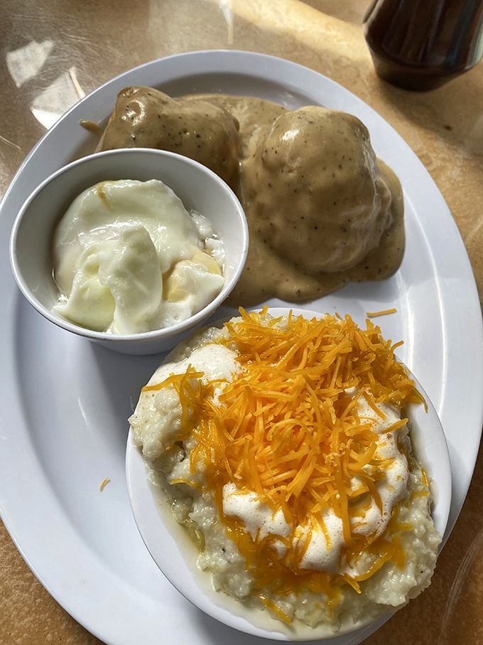A plate that answers the eternal question: "What if clouds were made of gravy?" These biscuits, drowning happily in peppery goodness, make a compelling case.