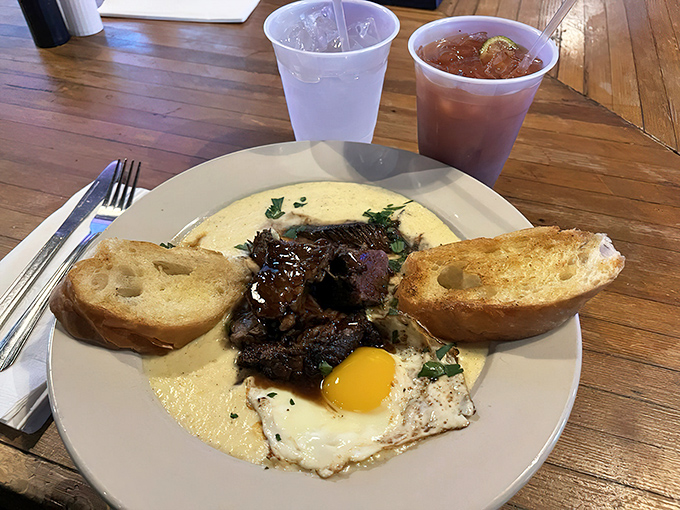 Breakfast of champions: rich braised beef, perfectly runny egg, and toast ready to soak up every last bit of that glorious sauce.