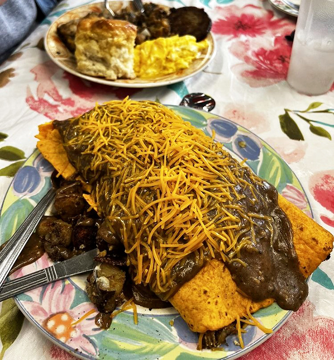 Breakfast meets engineering marvel as this burrito, smothered in gravy and cheese, demonstrates why forks were invented in the first place.