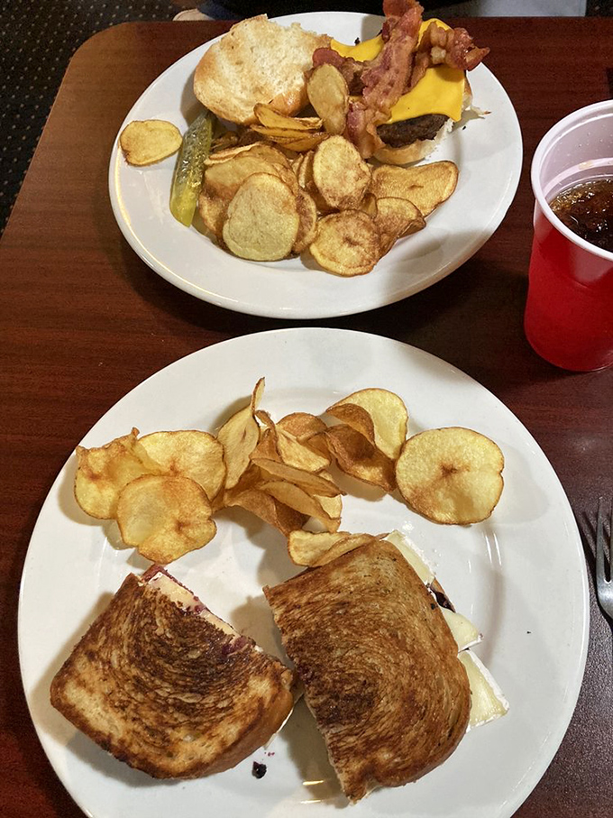 Whoever paired melty cheese with sweet berries deserves a culinary Nobel Prize. This sandwich bridges worlds like the transcontinental railroad.