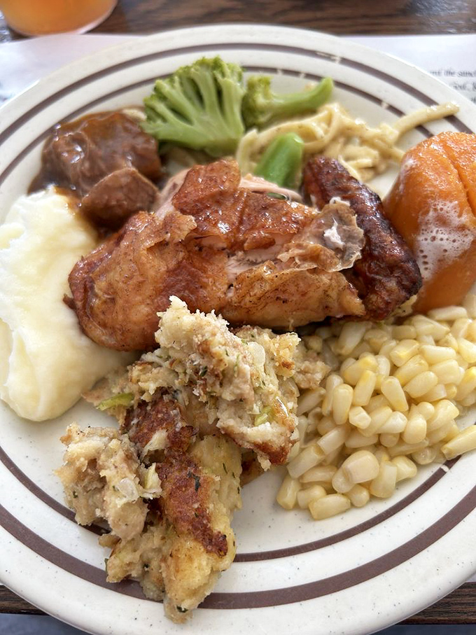 A perfect buffet plate doesn't exi&mdash; Oh wait, here it is! Golden chicken, buttered corn, and bread filling that would make grandma jealous.