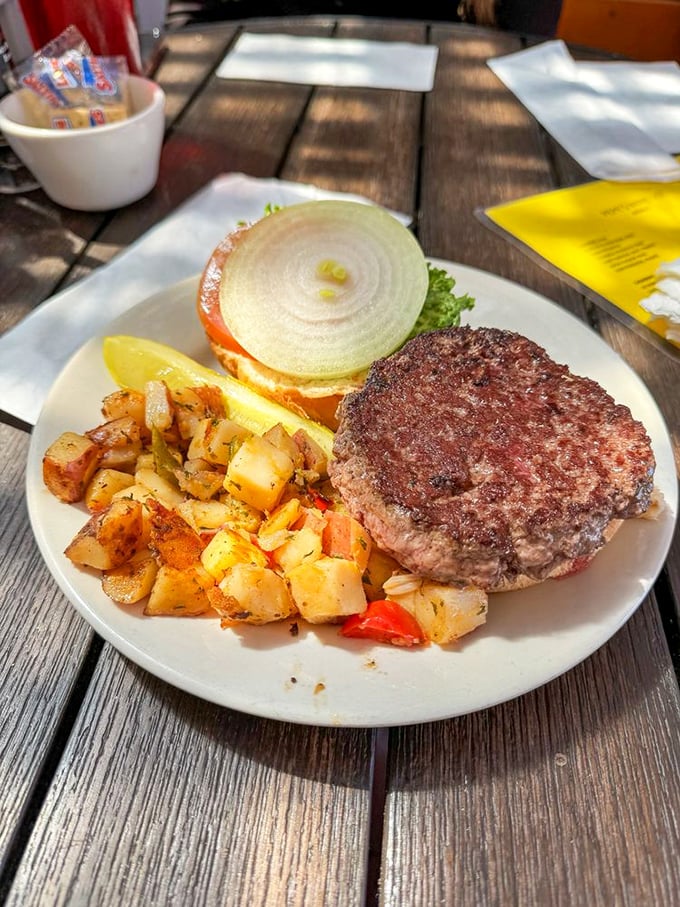 A burger that doesn't need fancy toppings to make its point, just honest beef, fresh toppings, and potatoes that didn't come from a freezer.