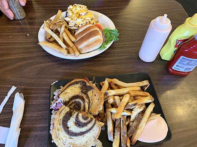 A study in American classics: the Reuben's marbled rye meets crispy fries in a plate that screams "vacation from your diet."